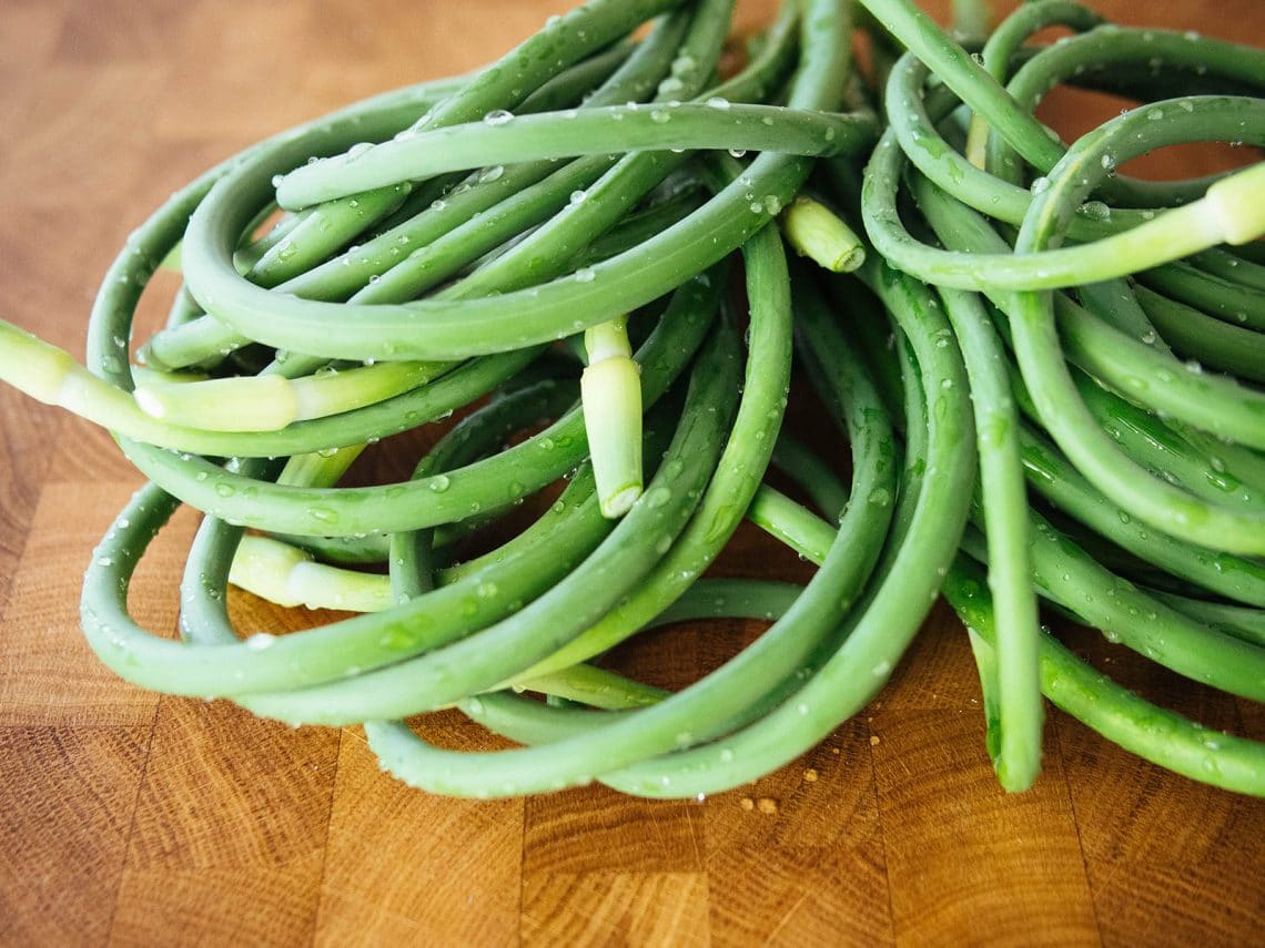How to Harvest Garlic Scapes (Plus My Trick for Getting the Part Most ...