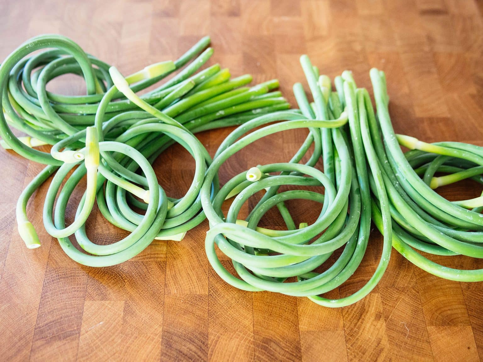 9 Easy Ways to Use Garlic Scapes in Your Everyday Cooking - Garden Betty